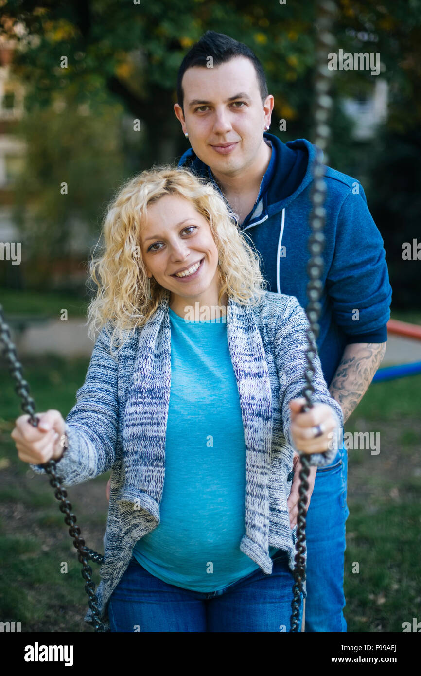Husband pregnant wife on swing hi-res stock photography and images - Alamy