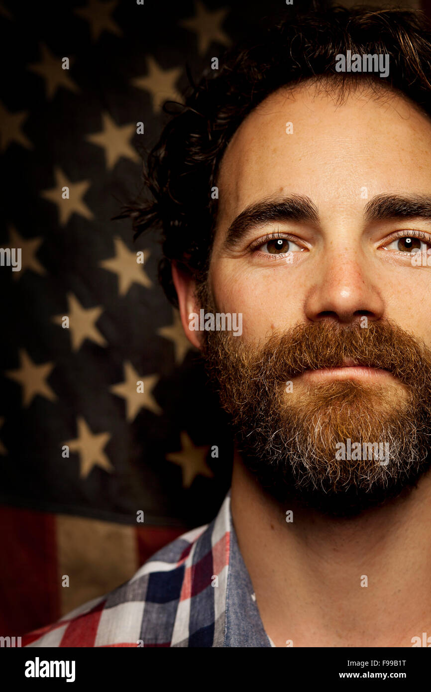 A man poses for a portrait as a first time voter in the November 2012 ...
