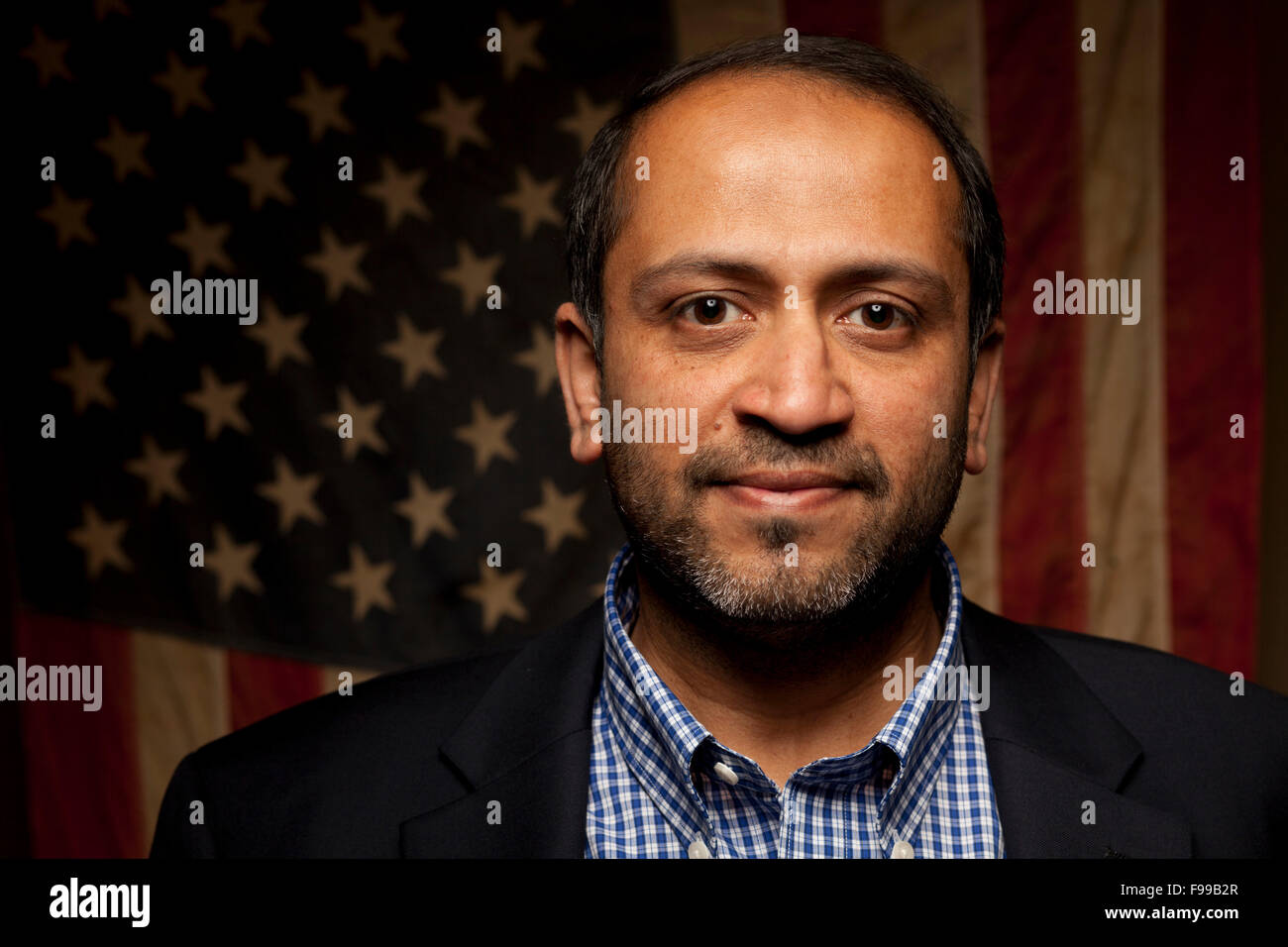 A man poses for a portrait as a first time voter in the November 2012 ...