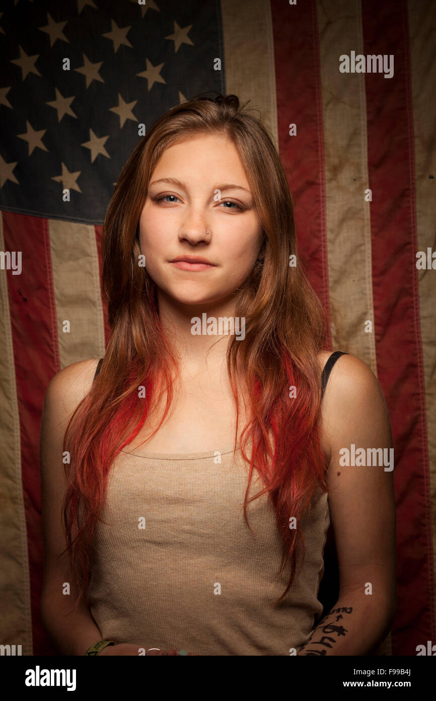 A woman poses for a portrait as a first time voter in the November 2012 ...