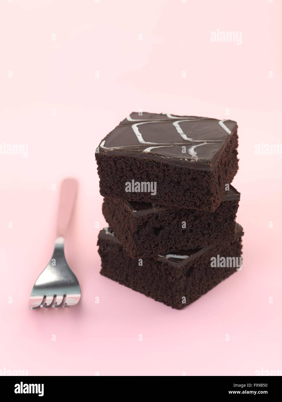 Chocolate Mud Cake Slices Stock Photo - Alamy