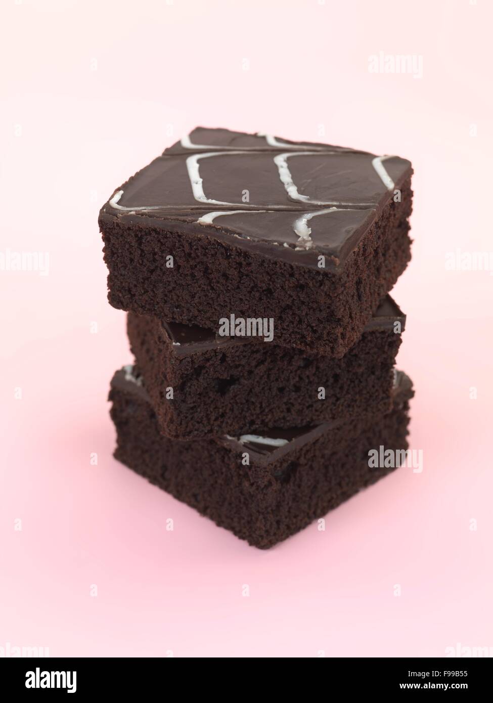 Chocolate Mud Cake Slices Stock Photo - Alamy