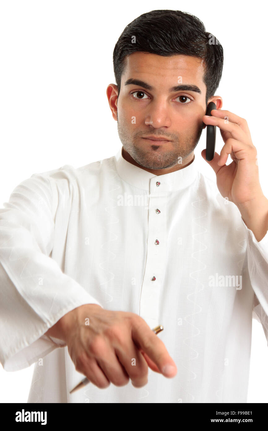 Arab ethnic man pointing finger Stock Photo - Alamy
