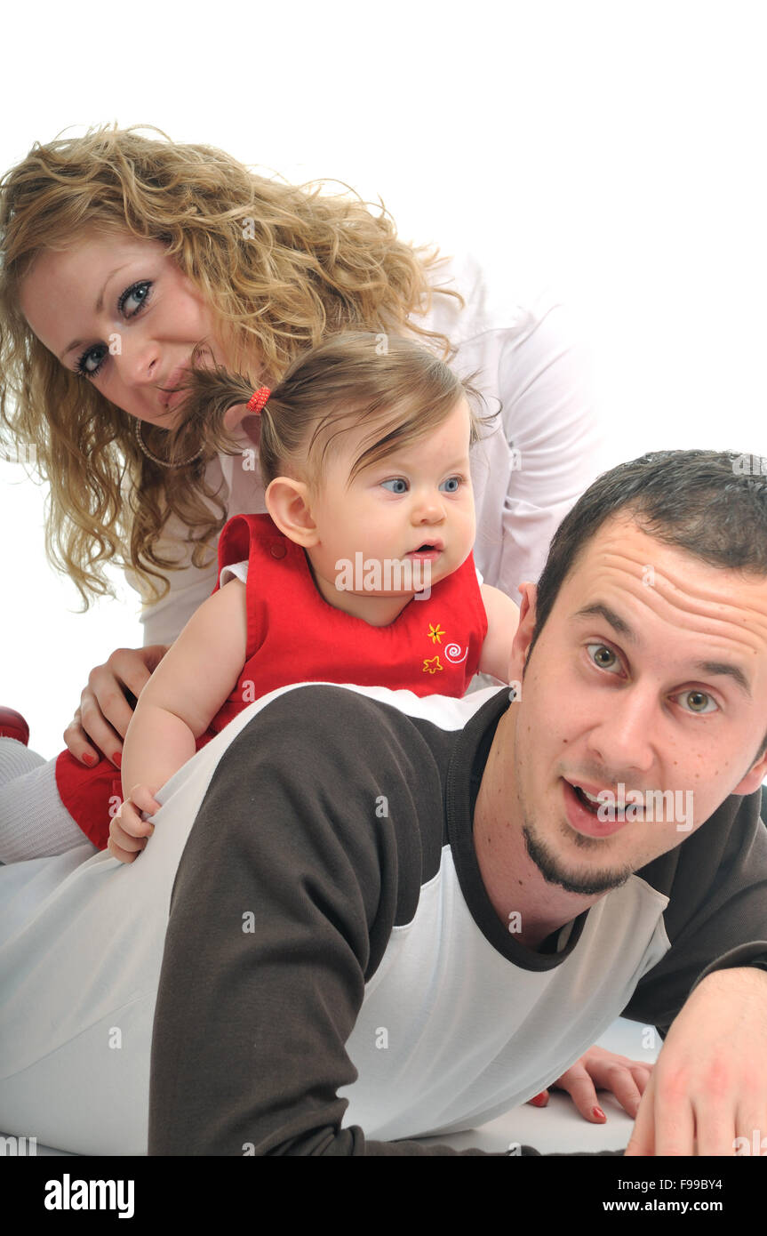 young happy family with beautiful baby isolated on white Stock Photo ...