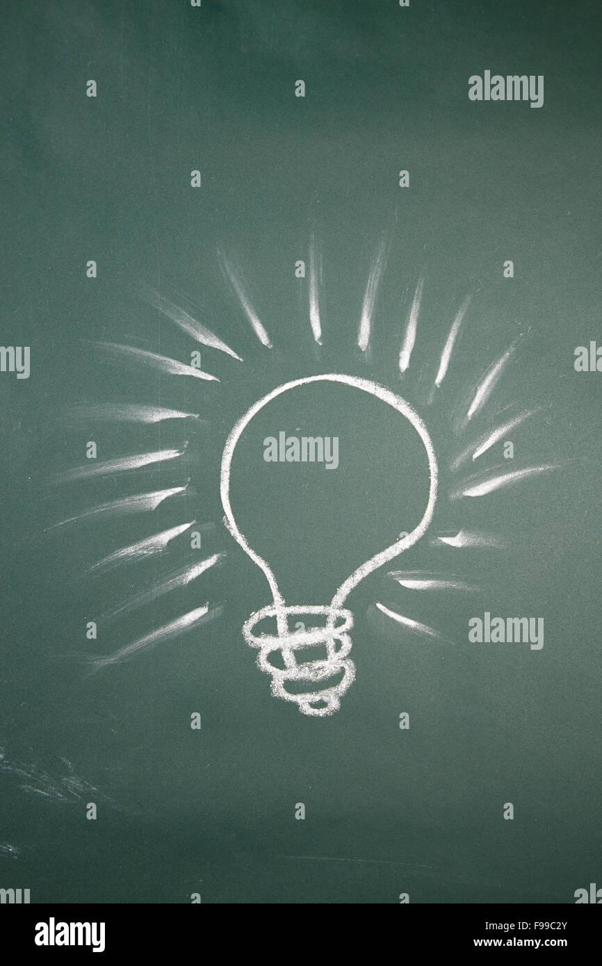 drawing- light bulb on blackboard Stock Photo - Alamy