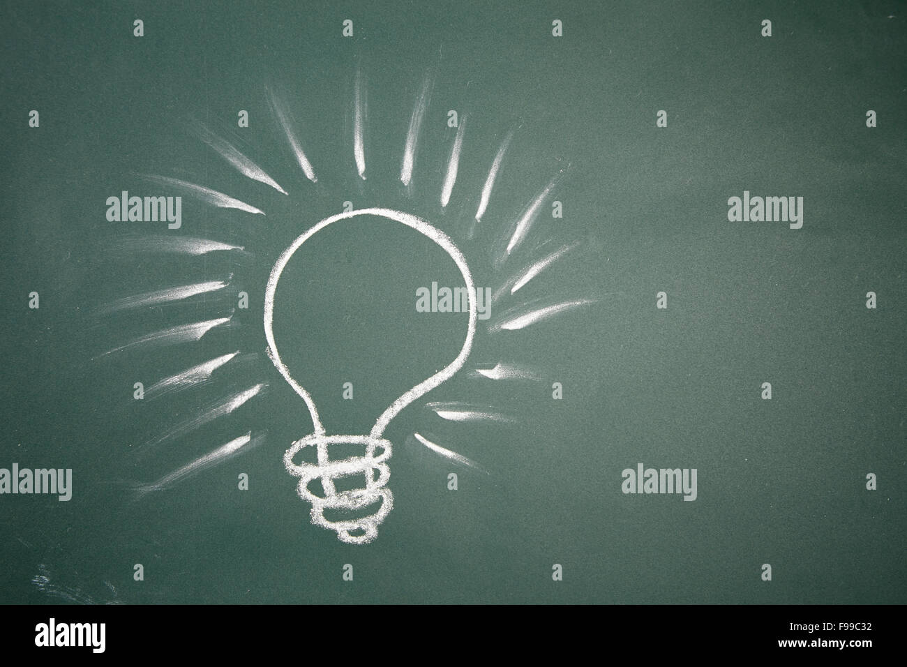 drawing- light bulb on blackboard Stock Photo - Alamy