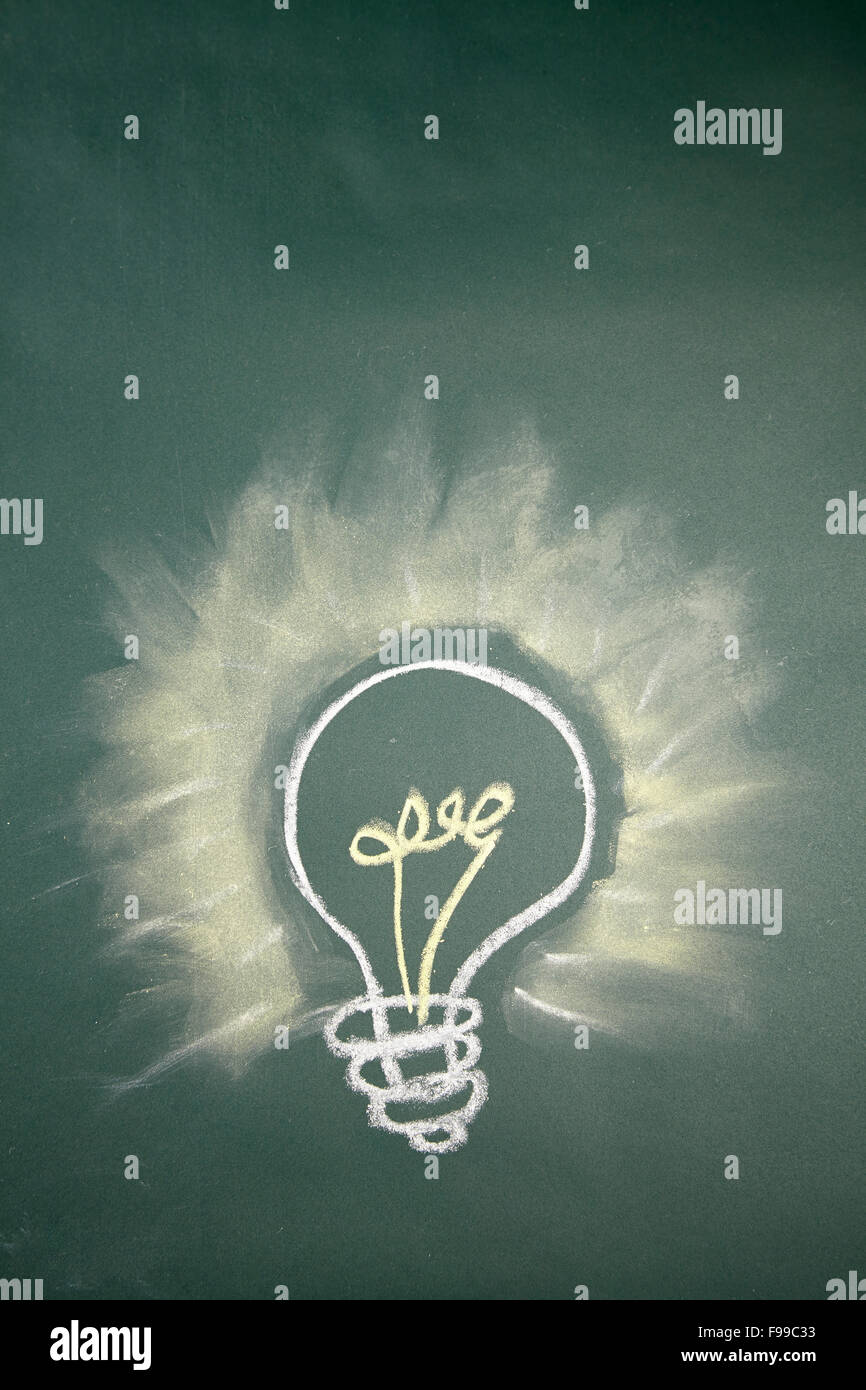 drawing- light bulb on blackboard Stock Photo - Alamy