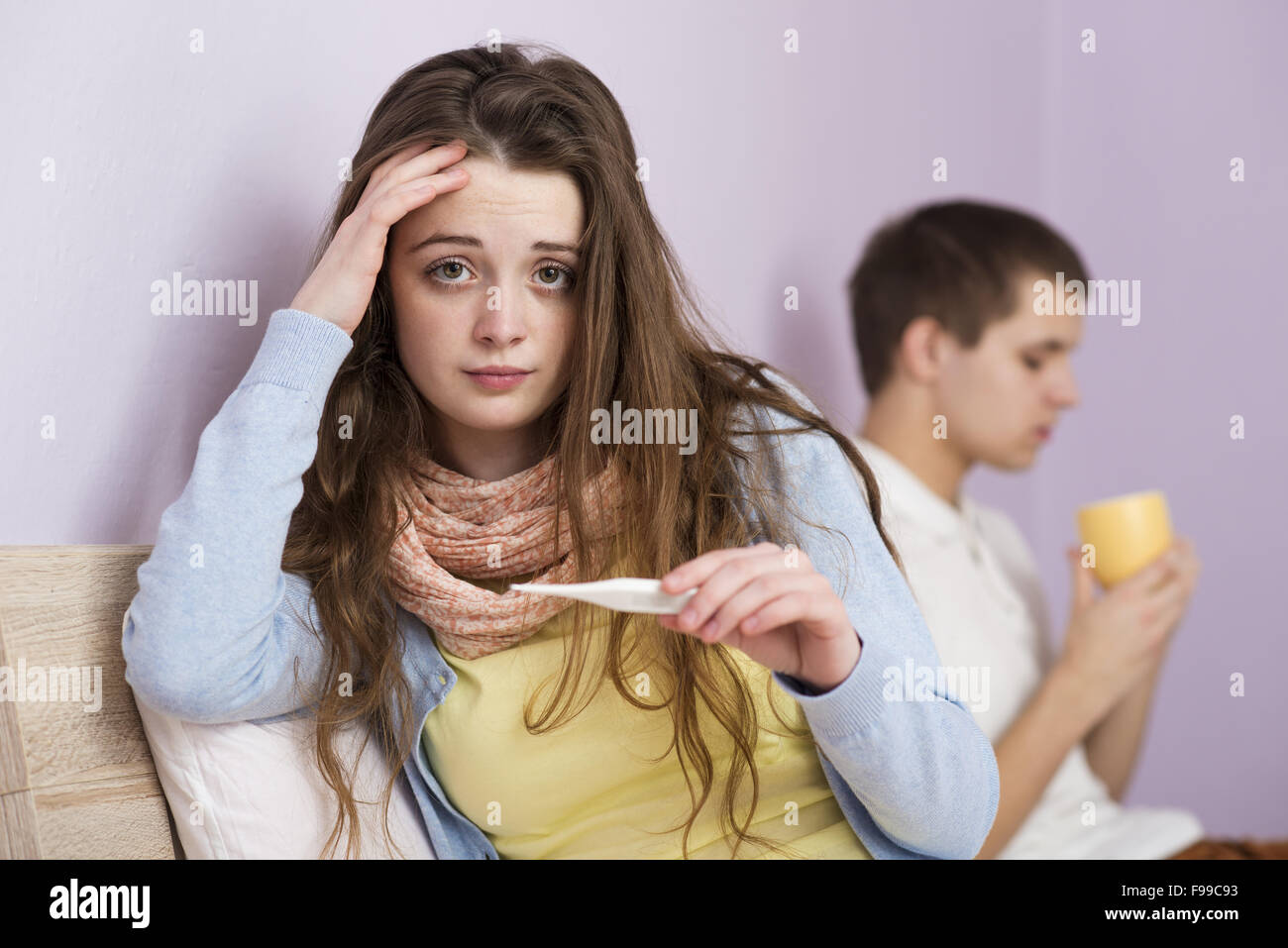 Sick woman and man have cold, flu and high fever Stock Photo - Alamy