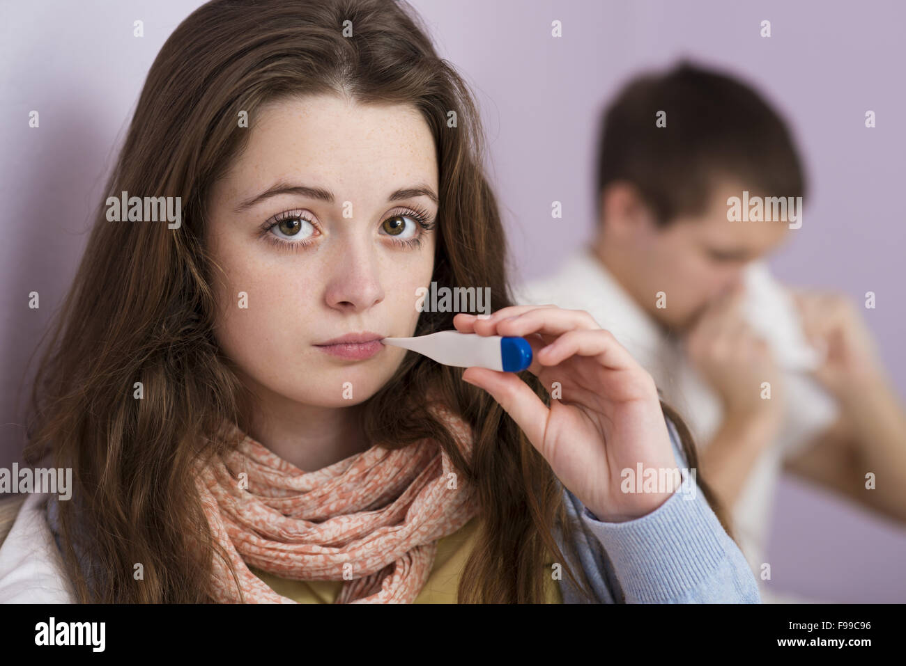 Sick woman and man have cold, flu and high fever Stock Photo - Alamy