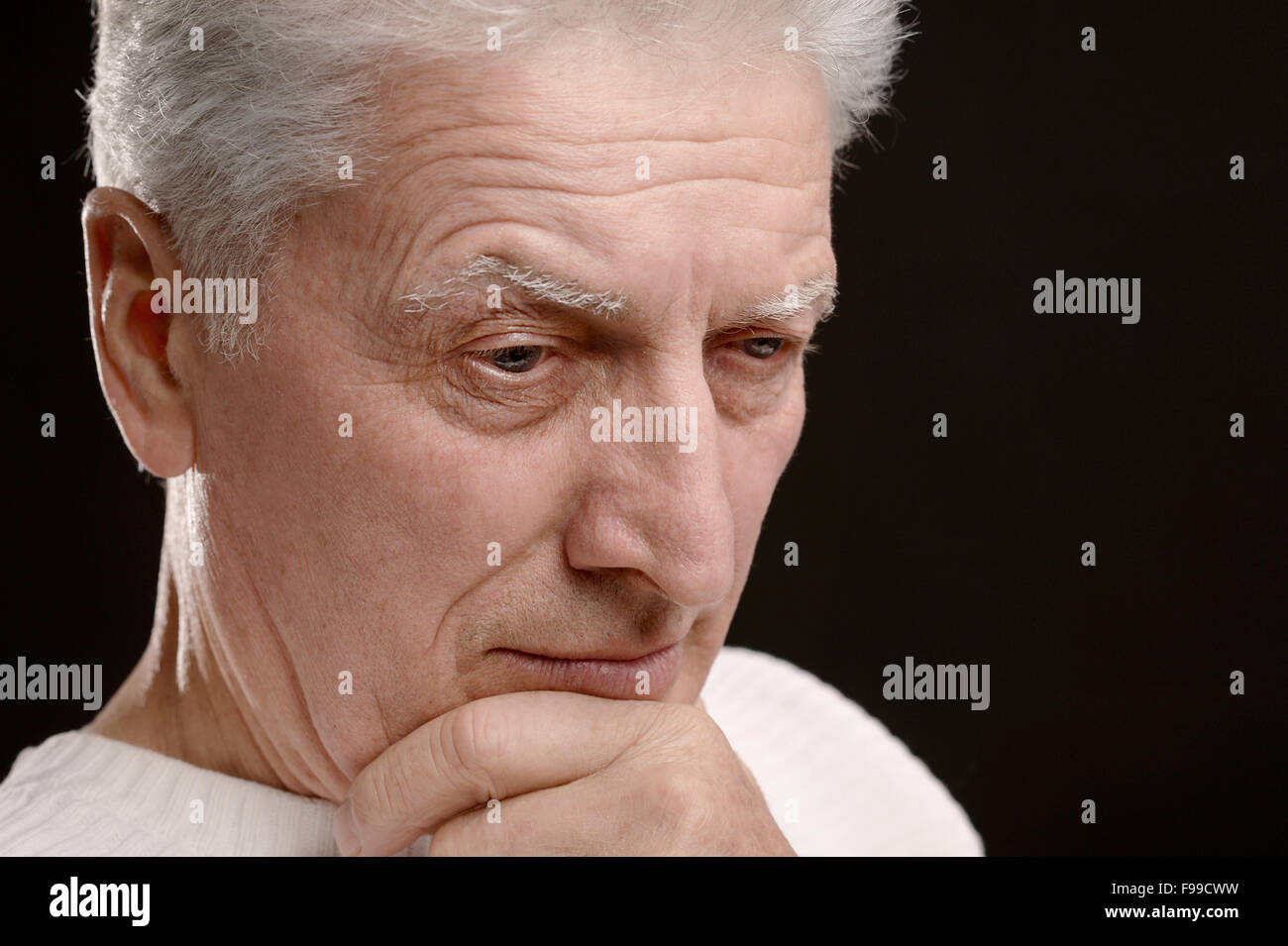 Sad senior man Stock Photo - Alamy