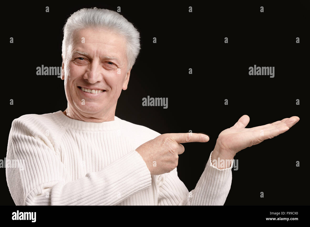 Aged man pointing Stock Photo - Alamy