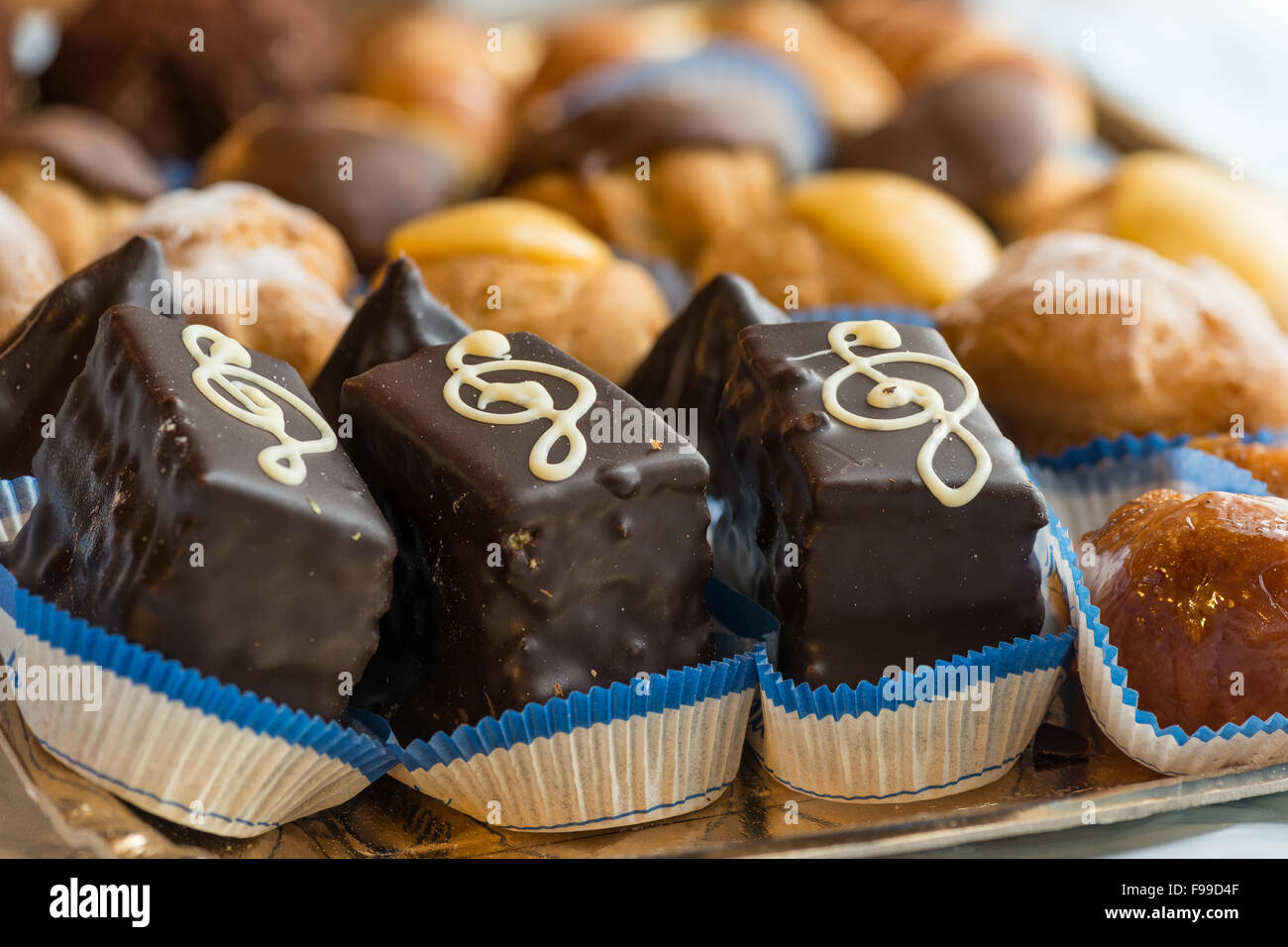 In the pictured colorful pastries with cream and chocolate, the real ...