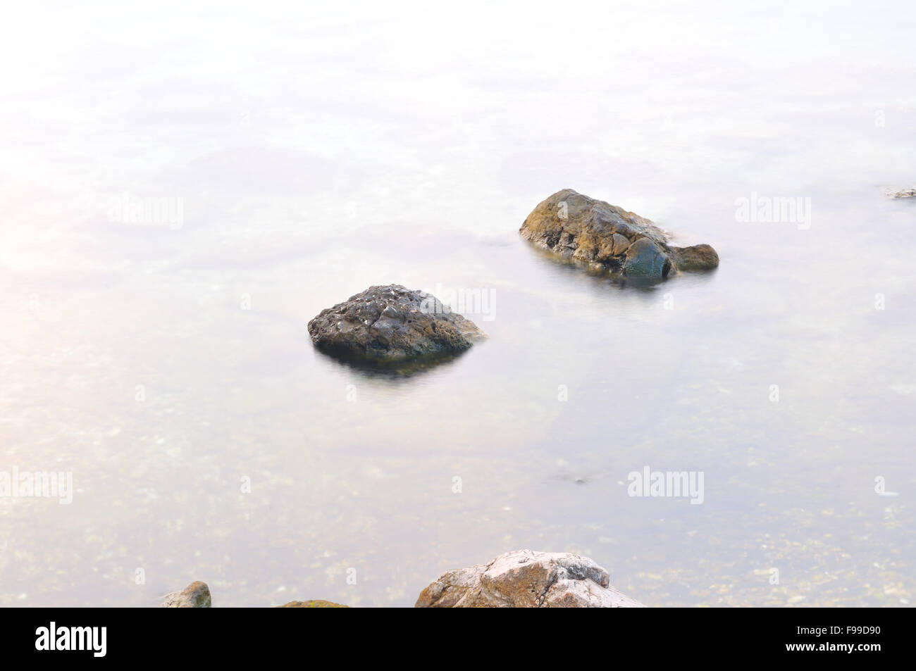 sea rock with long exposure representing a peace and harmony concept ...