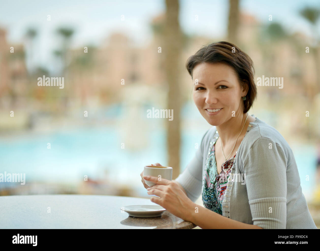 Woman cup coffee pool hi-res stock photography and images - Alamy
