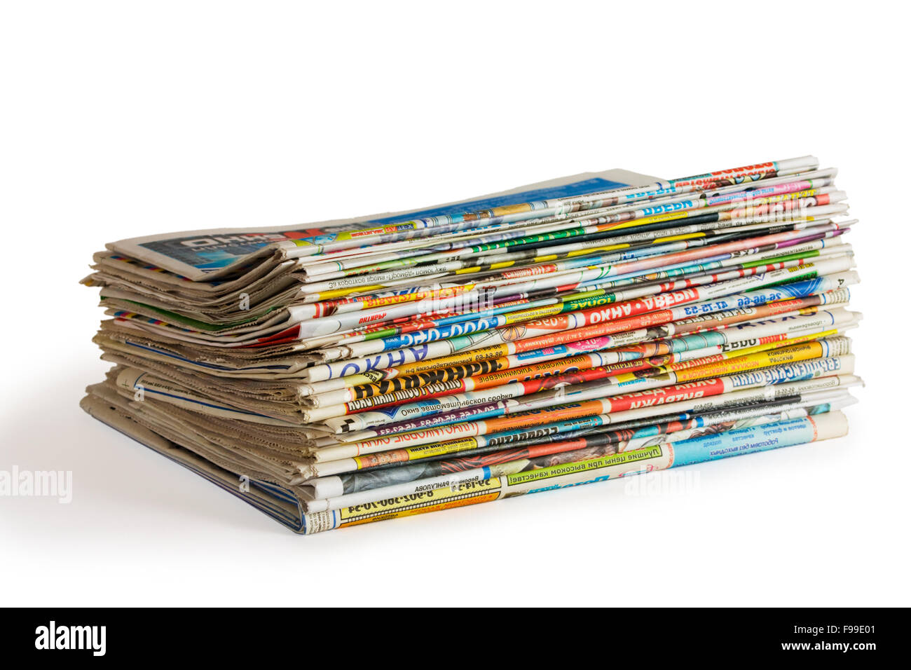 A pile of newspapers isolated on a white background Stock Photo - Alamy