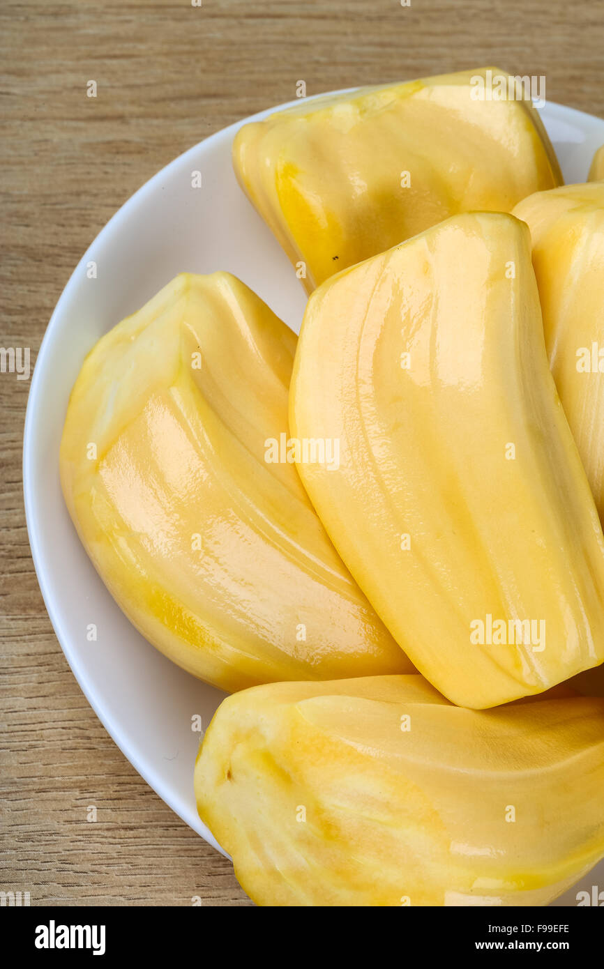 Tropical Jack Fruit on the wood background Stock Photo - Alamy