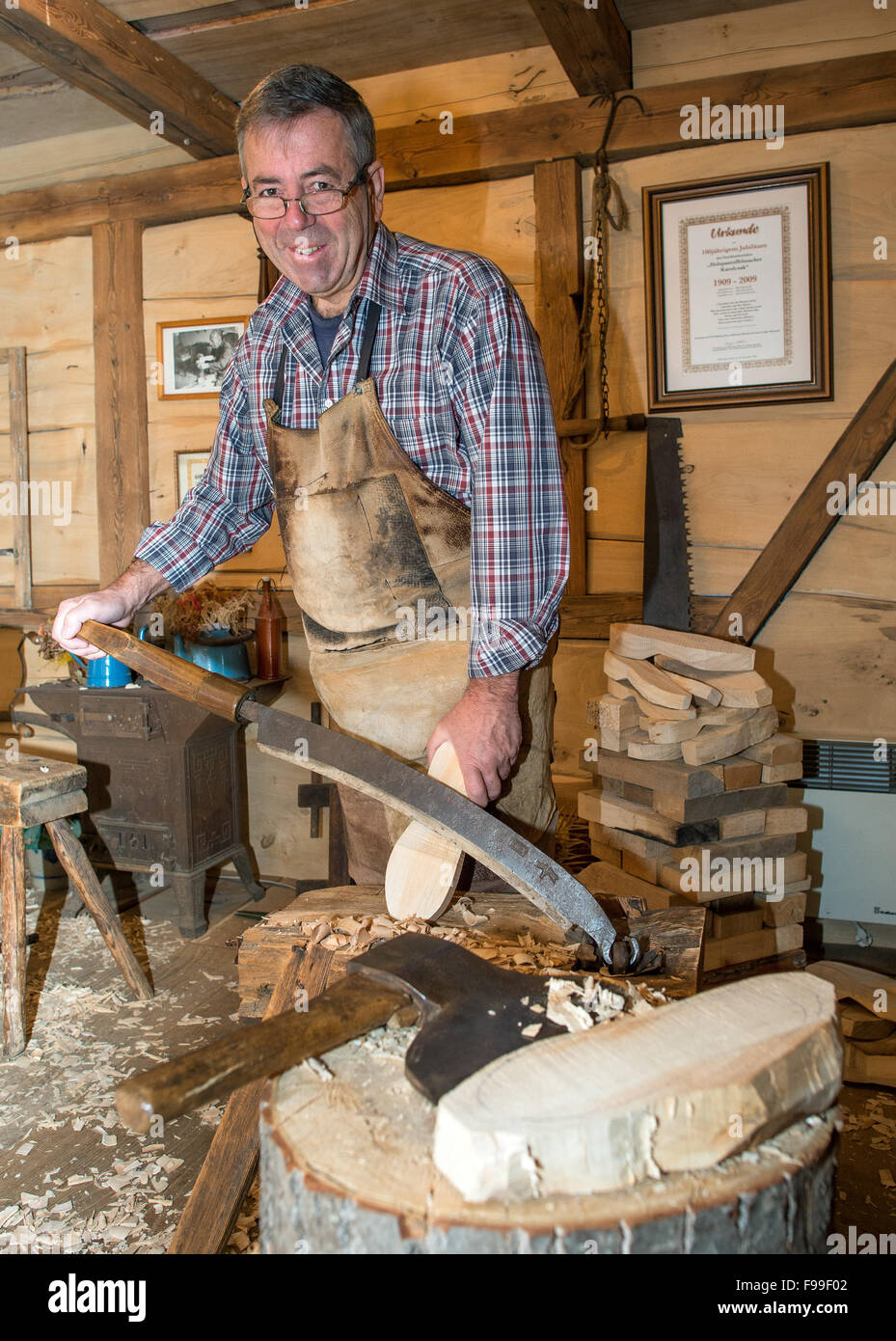 Clog maker Manfred Karolczak works with a pressure gauge on a wooden ...