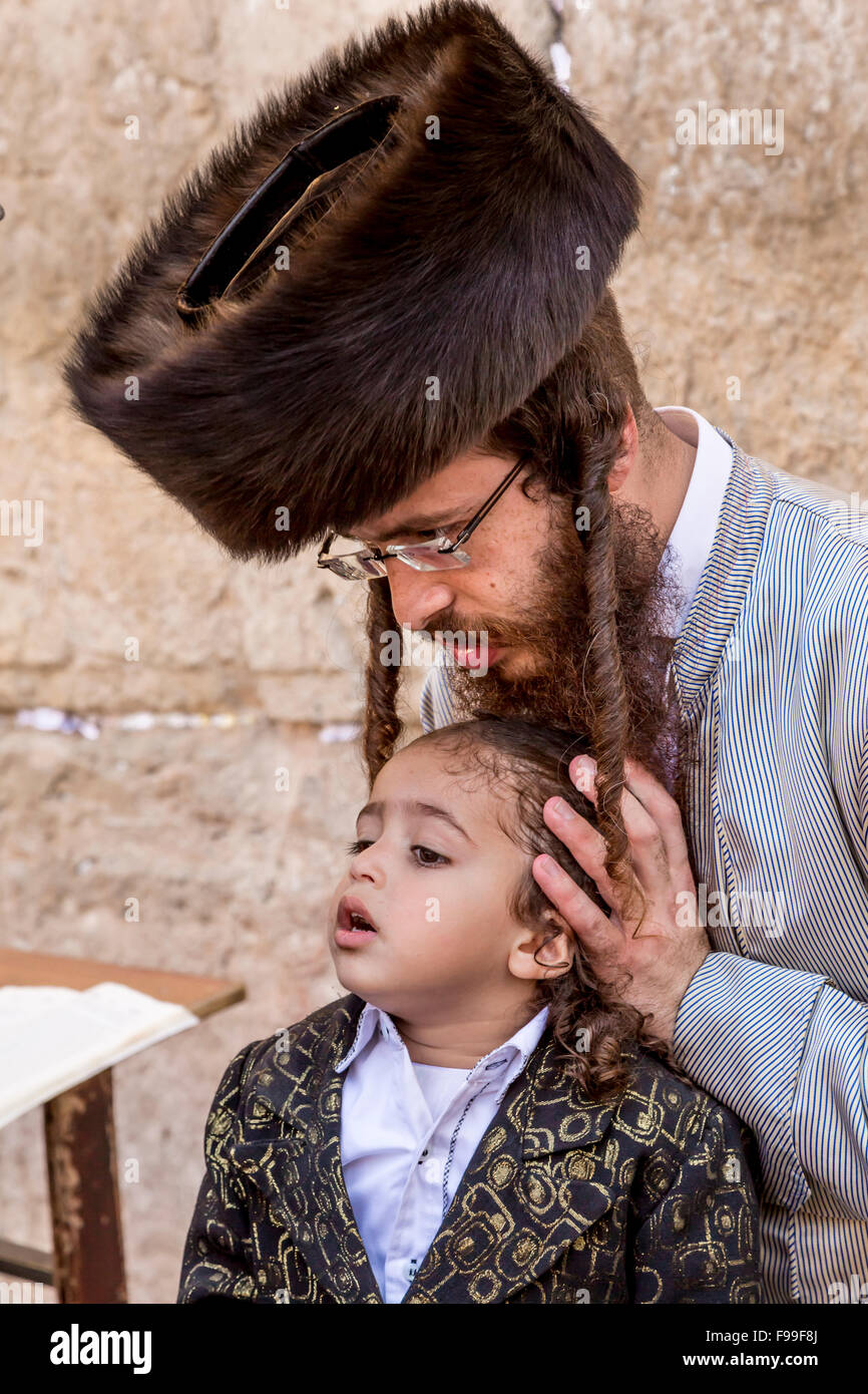 An Orthodox Jewish Upsherin ceremony at the Western Wall in Jerusalem ...