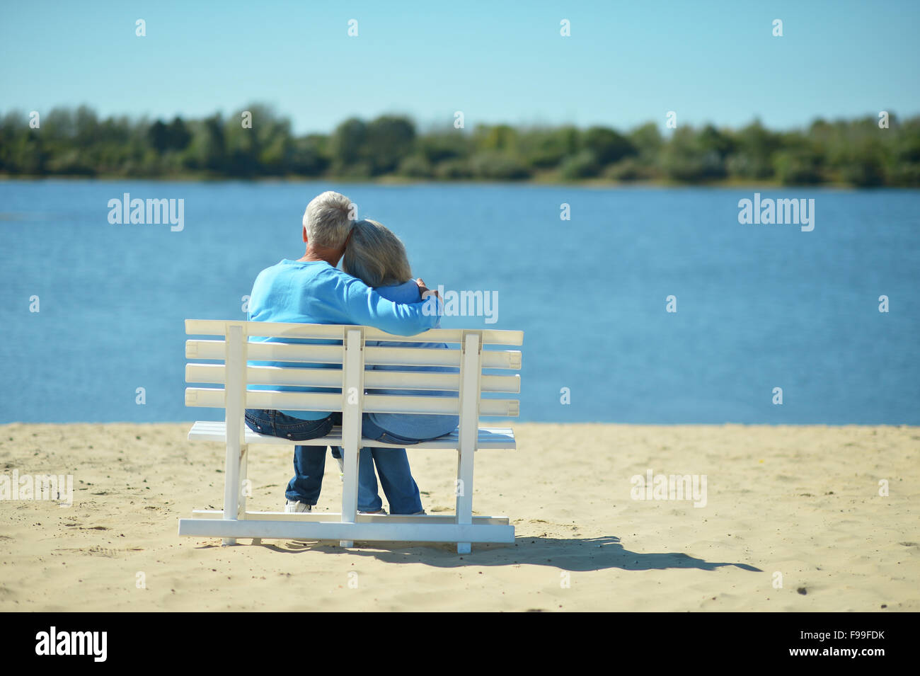 elderly couple rest at tropical resort Stock Photo - Alamy