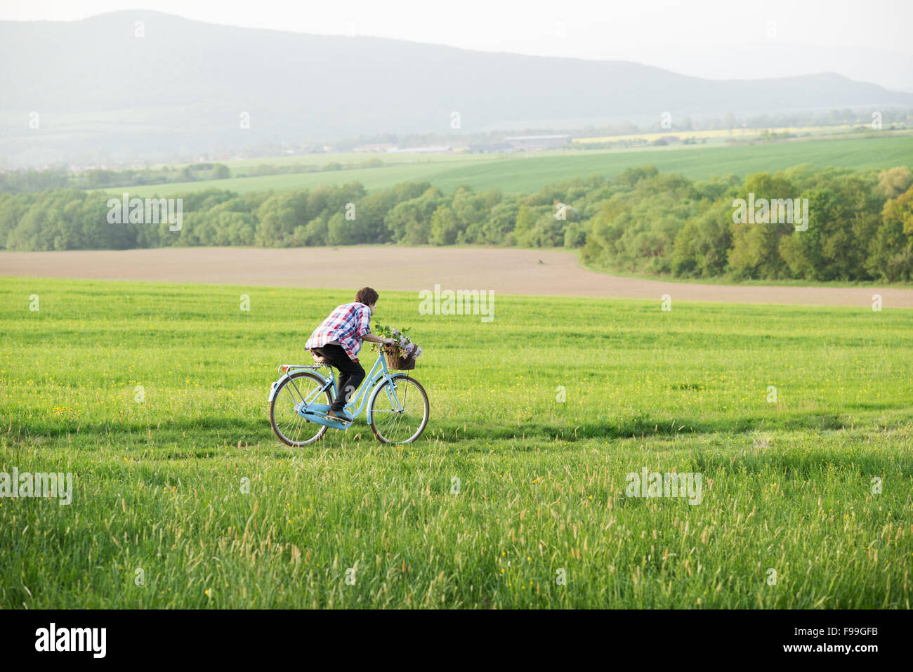 Vintage man cycling hi-res stock photography and images - Alamy