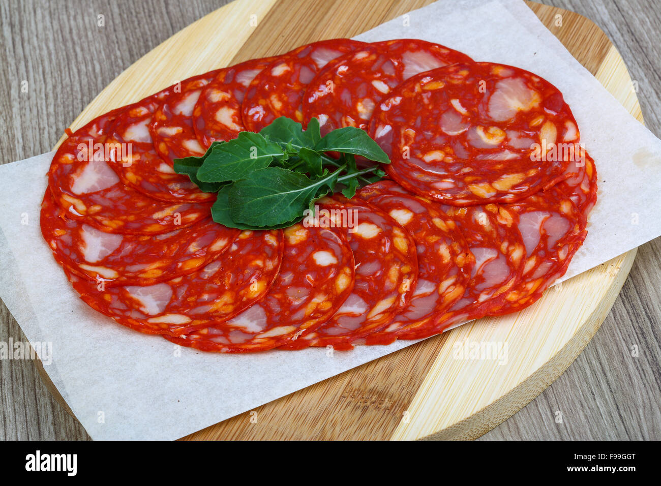 Traditional Spanish salami - Chorizo sausage on the wood background ...