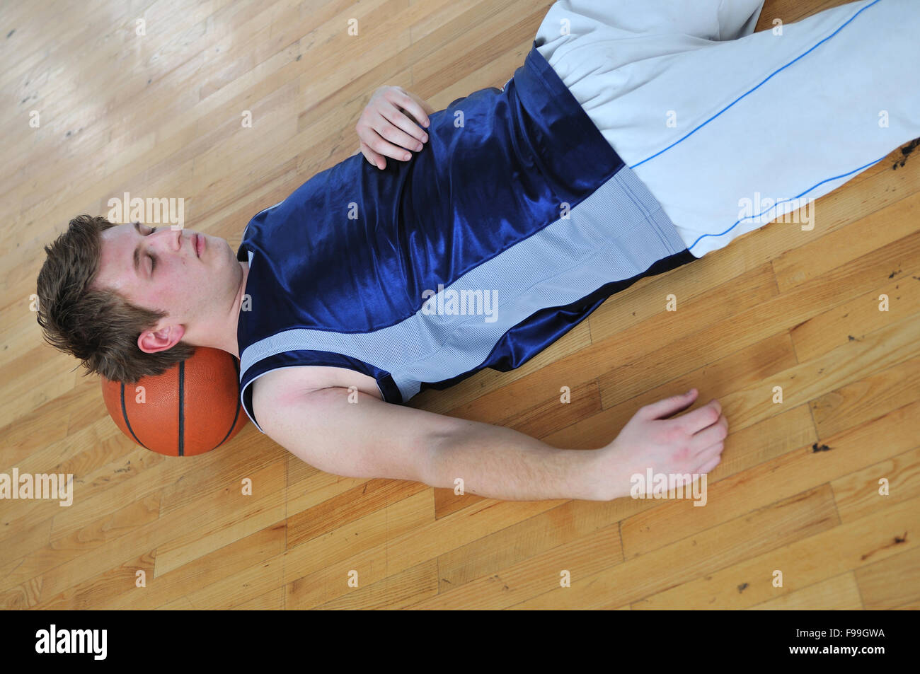 basketball players reslax and rest after hard game Stock Photo - Alamy