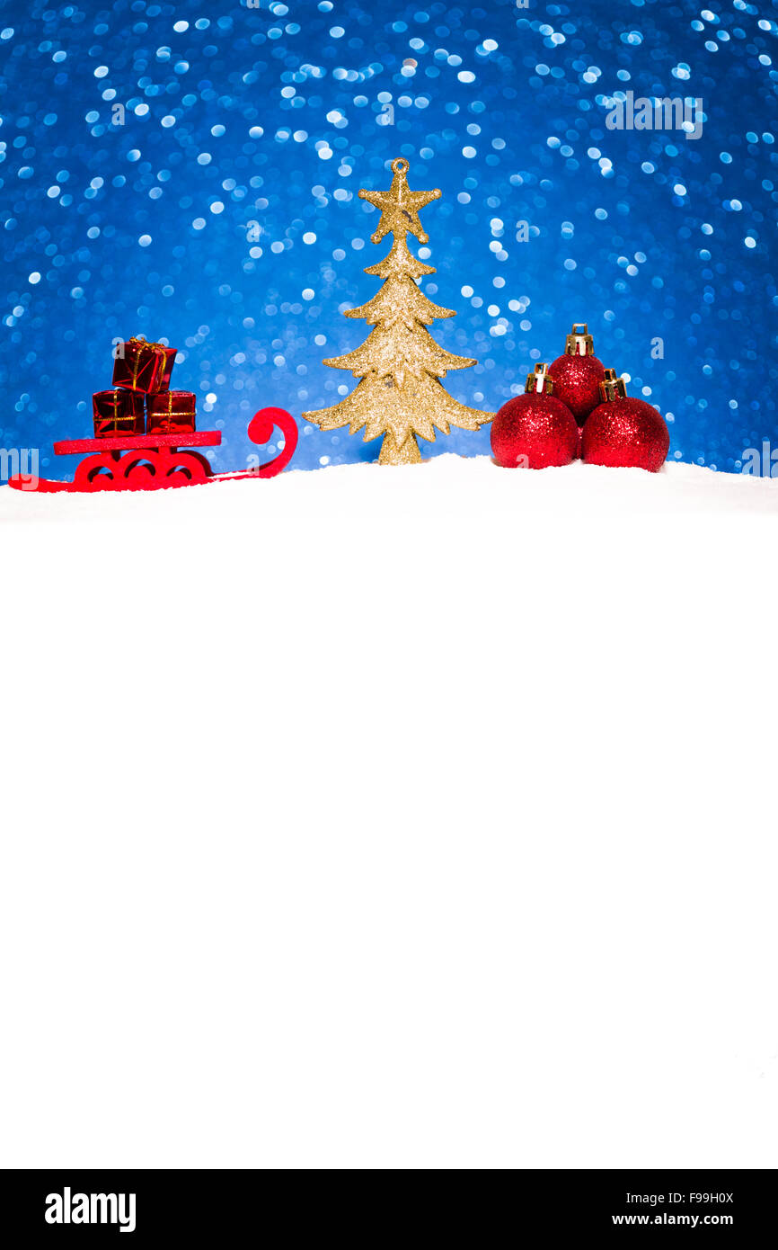christmas tree in snow on glitter background Stock Photo - Alamy