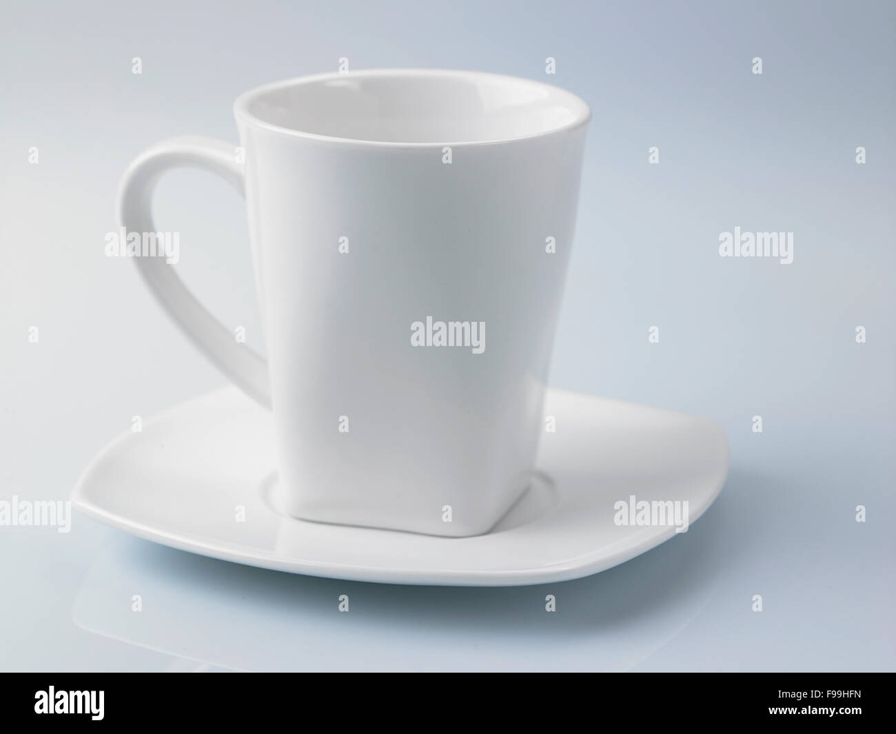 empty coffee cup on the white background Stock Photo - Alamy