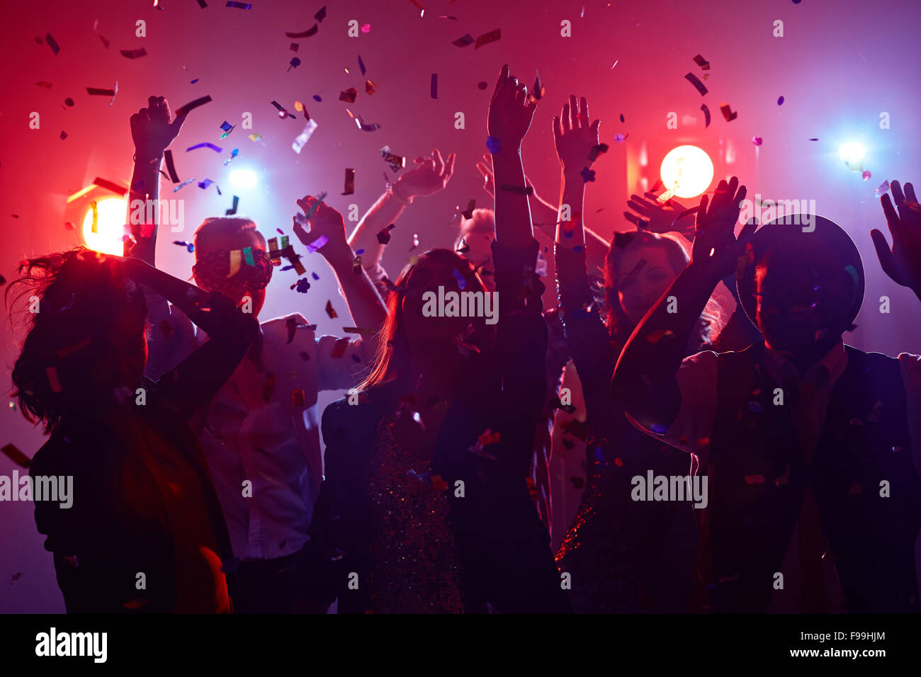Young people dancing in night club Stock Photo - Alamy