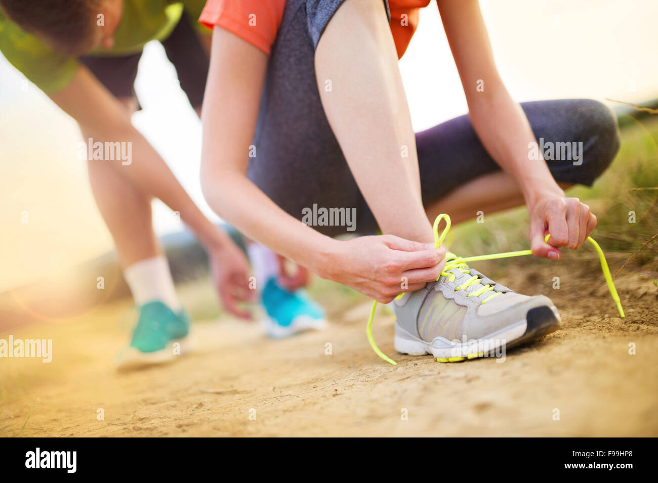 Runner feet. Running couple closeup of running shoes Stock Photo - Alamy
