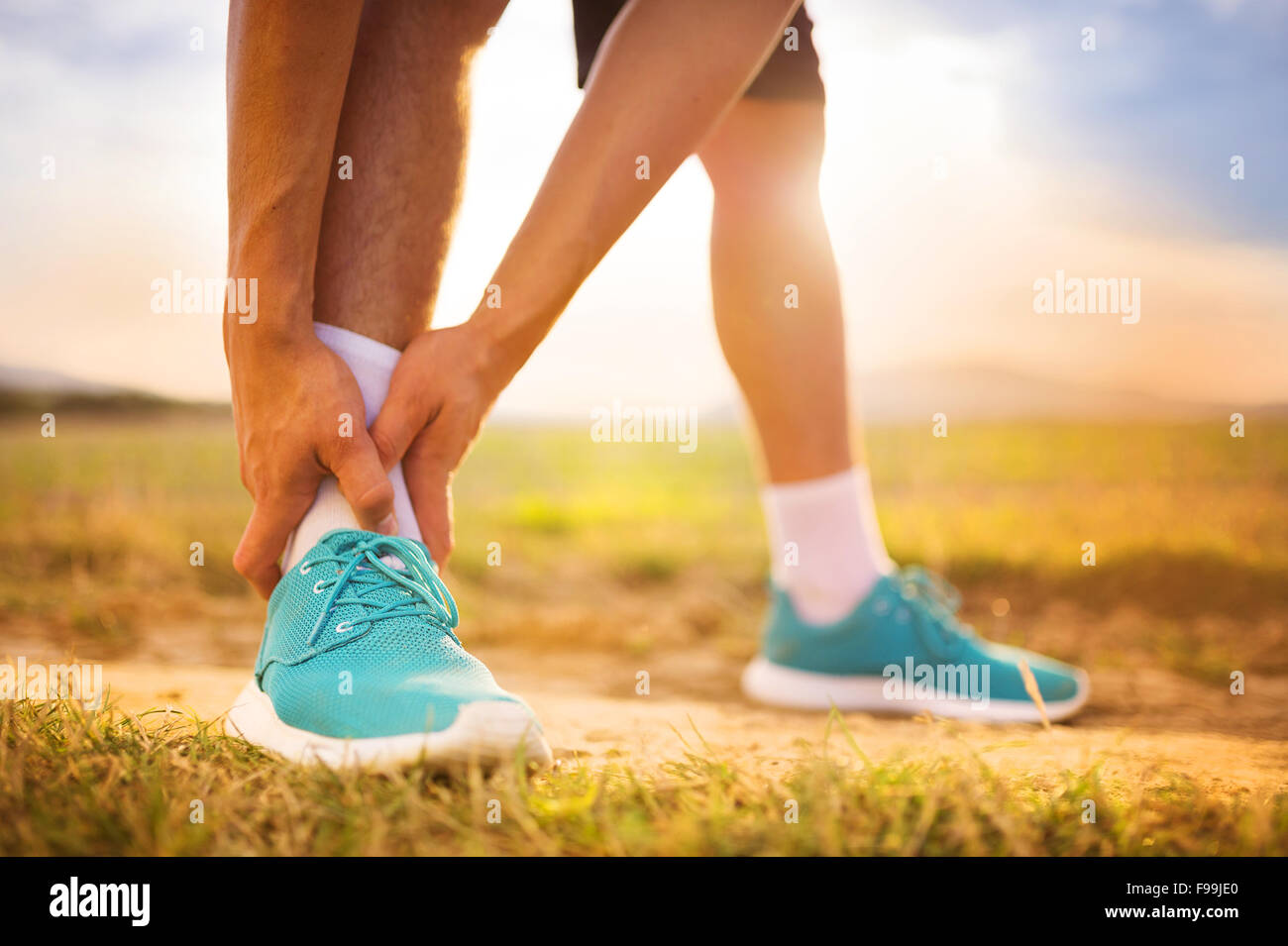 Running athlete sprain High Resolution Stock Photography and Images - Alamy