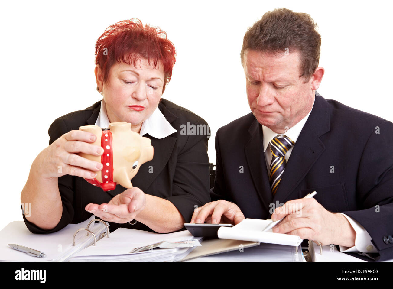 Elderly people with empty piggy bank lacking money Stock Photo - Alamy