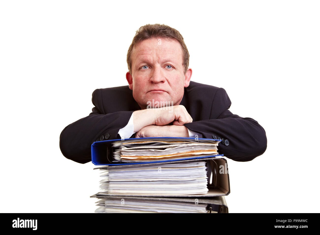 Frustrated senior business man with stack of files Stock Photo - Alamy