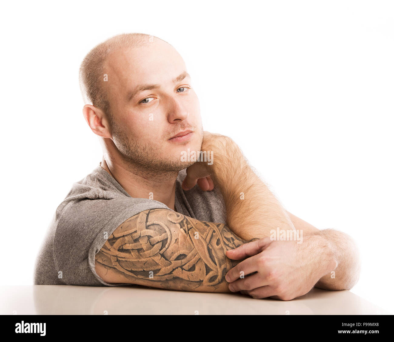 Handsome young man with tattoo, isolated on white Stock Photo - Alamy