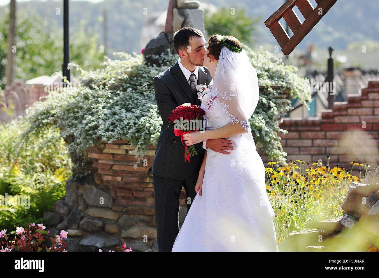 Wedding couple background small mill Stock Photo - Alamy
