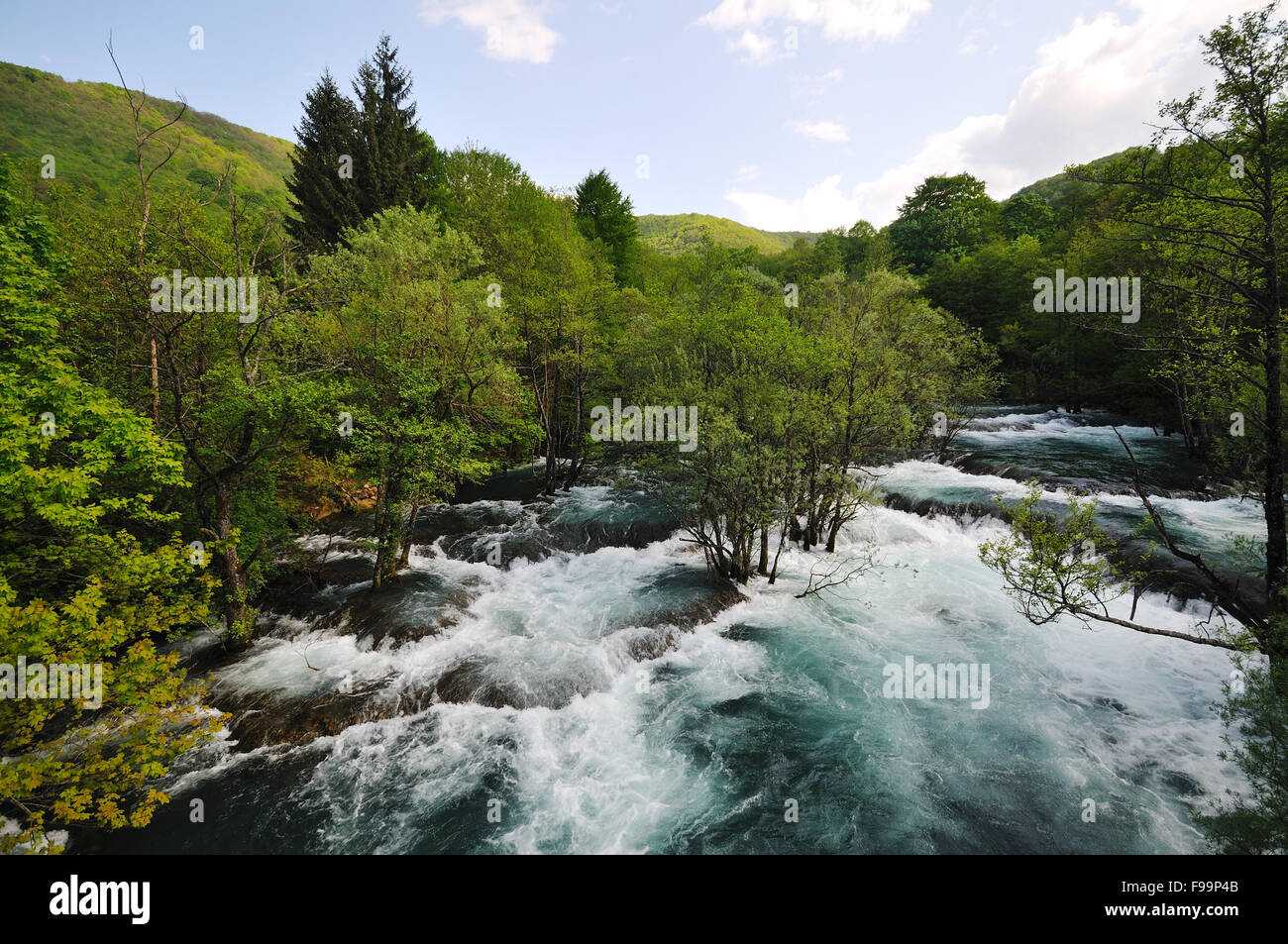 beautiful nature scene with river and waterfall at spring seasson Stock ...