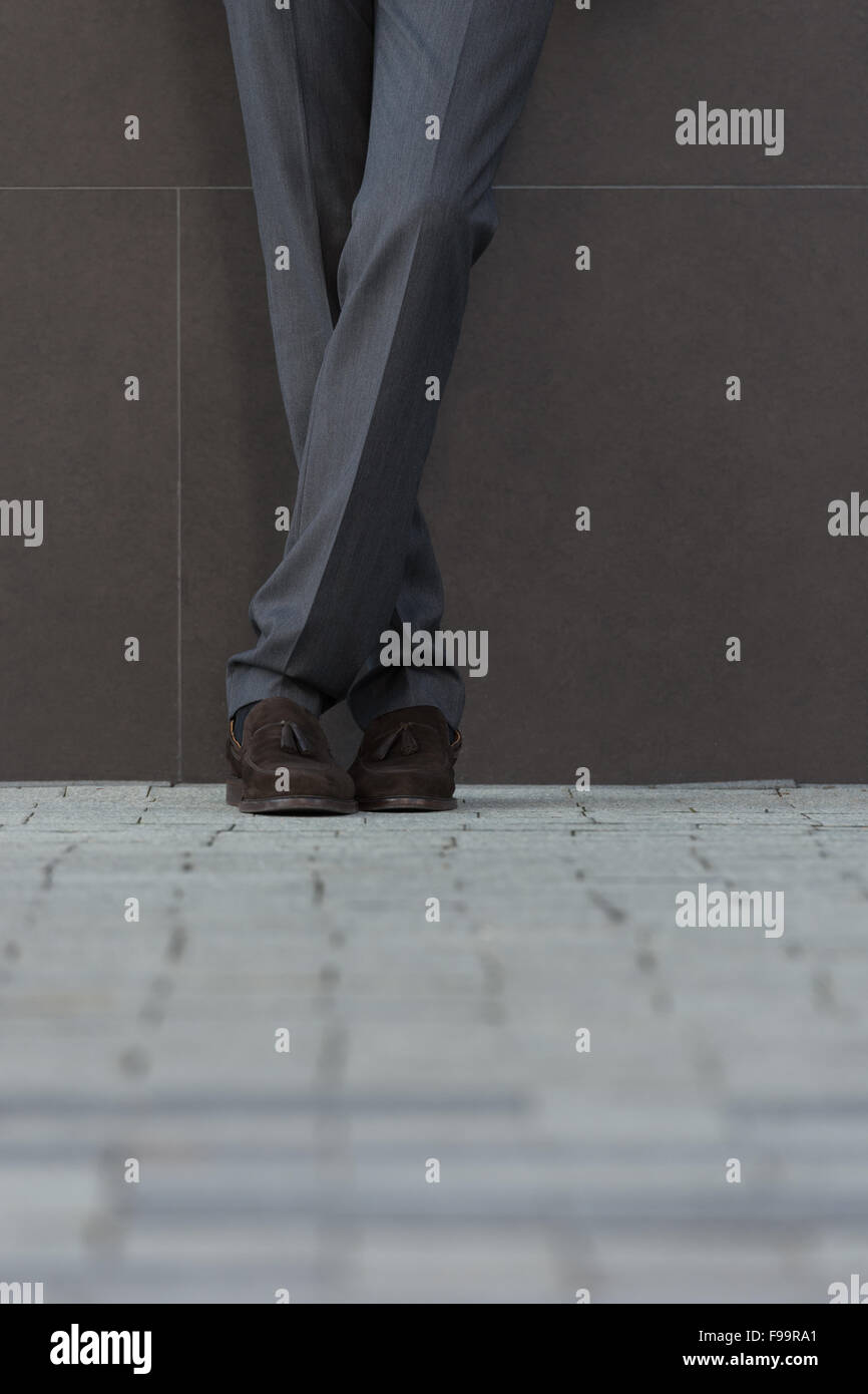 Closeup of businessman legs on the street Stock Photo - Alamy
