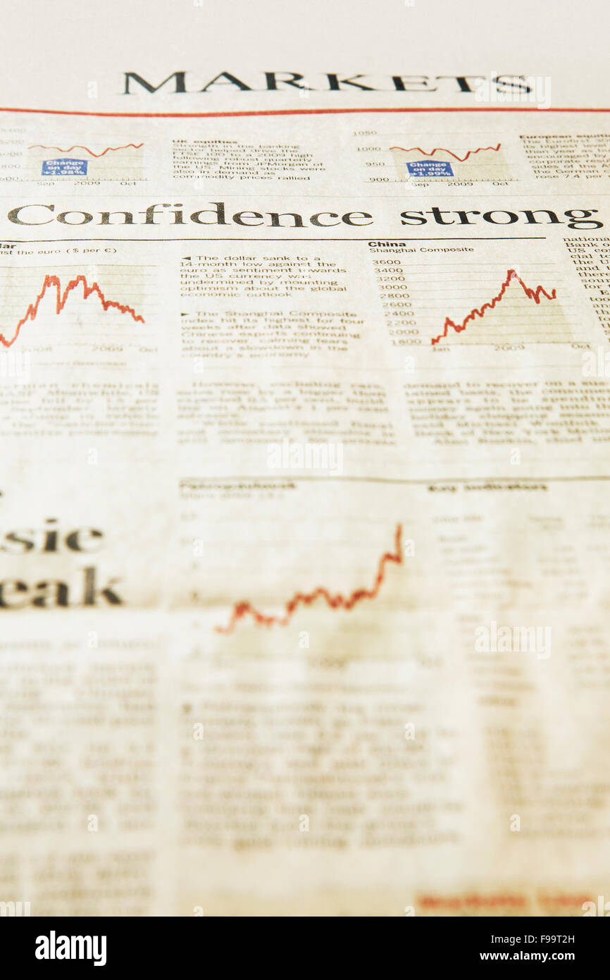 News paper Stock market financial charts showing slight growth w Stock ...