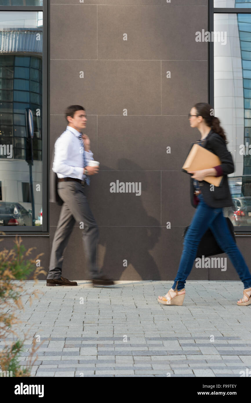 Office worker walking building hi-res stock photography and images - Alamy