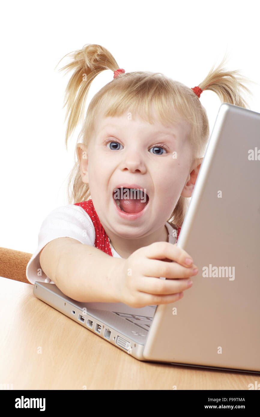 happy child and laptop Stock Photo - Alamy