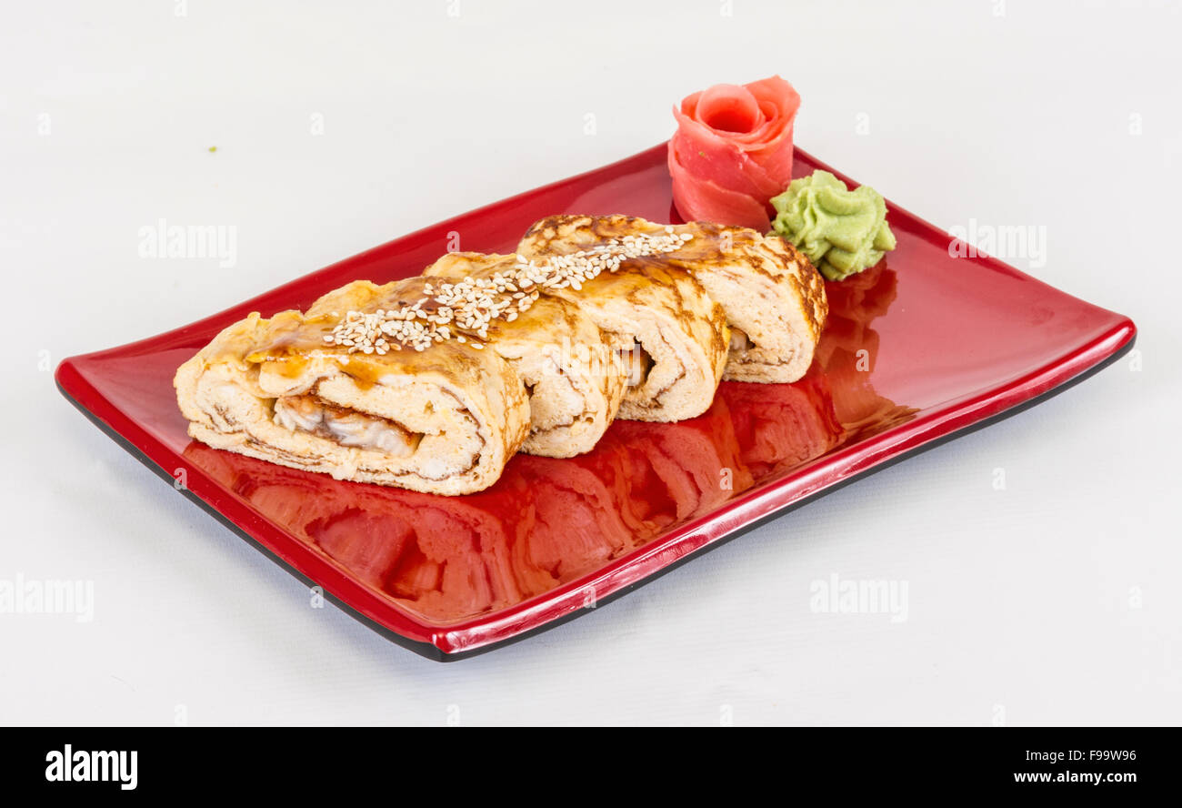 Omelet Maki Sushi - Roll made of Smoked Eel inside. Topped with Tamago ...