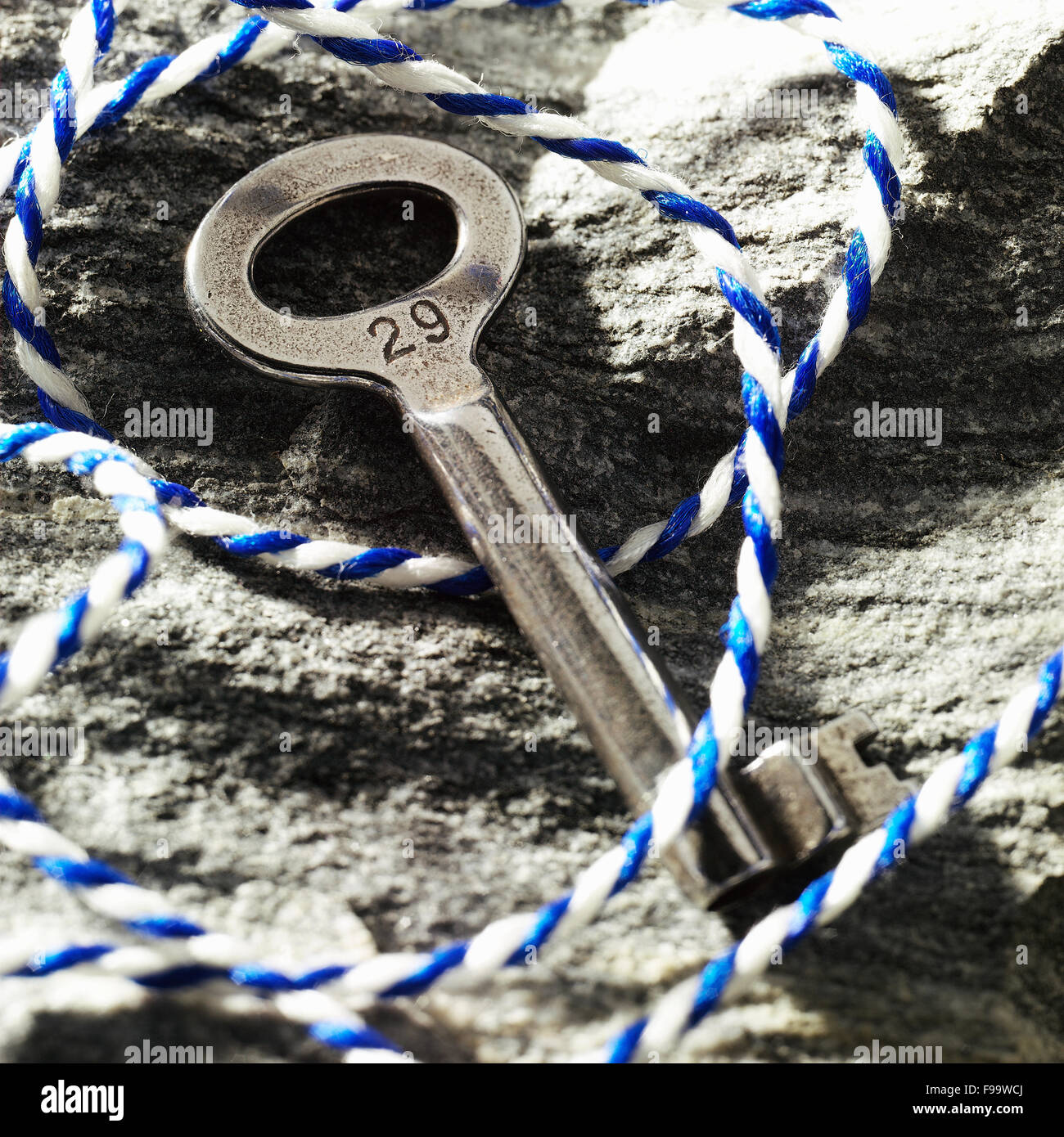 old key on rough stone #3 Stock Photo - Alamy