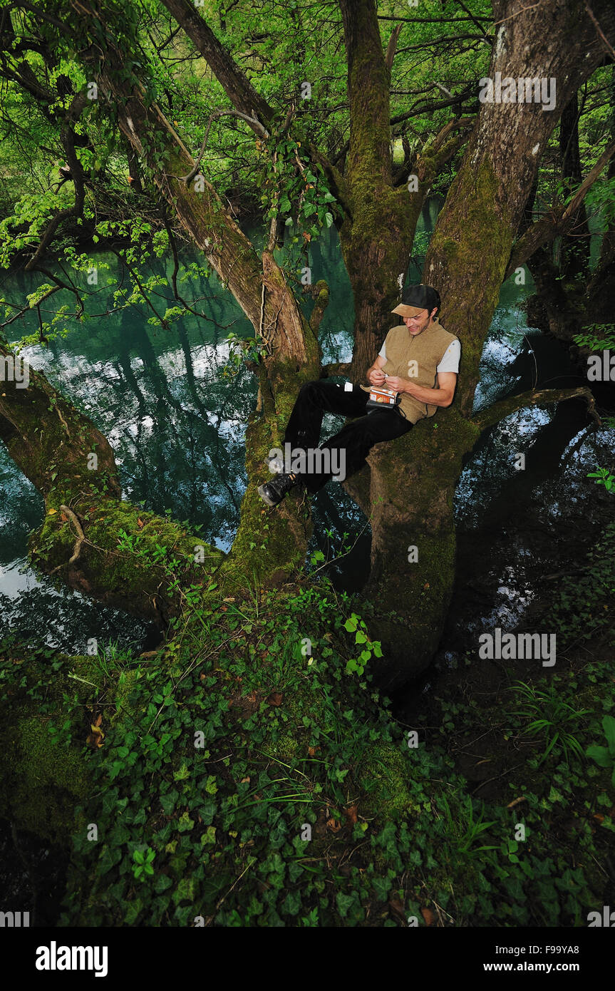 man outdoor in nature relaxing Stock Photo - Alamy