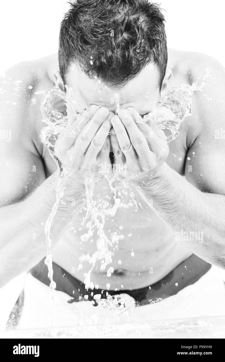 Young Man Washing Face With Clean Water And Representing Hygiene And