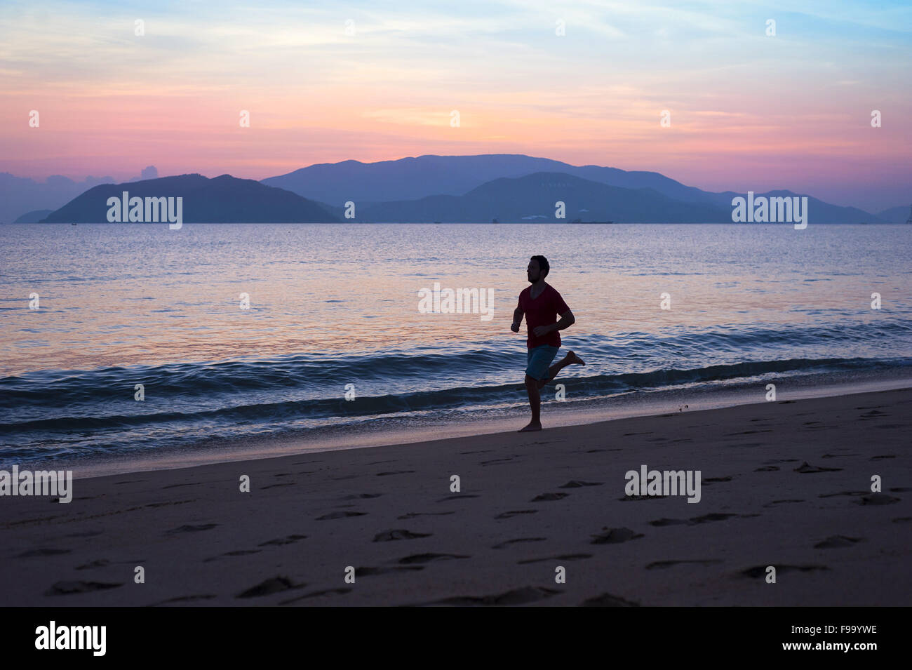 Handsome young people running hi-res stock photography and images - Alamy