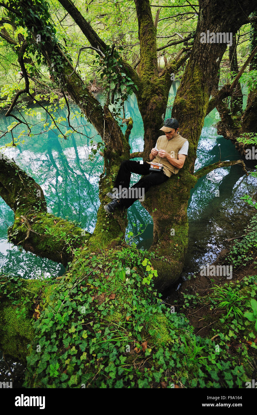 man outdoor in nature relaxing Stock Photo - Alamy