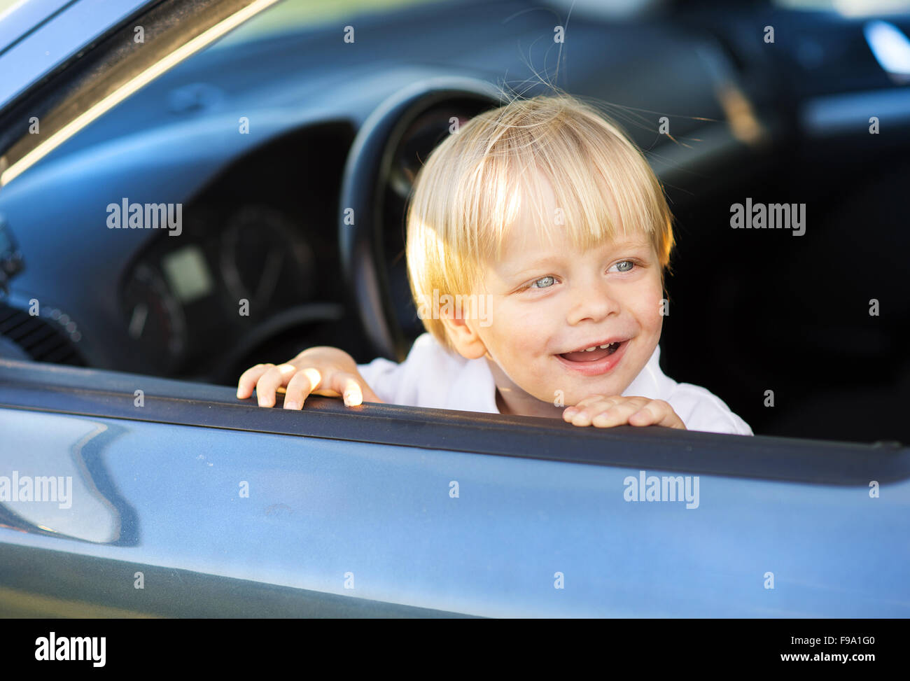 Child driving small car hi-res stock photography and images - Alamy