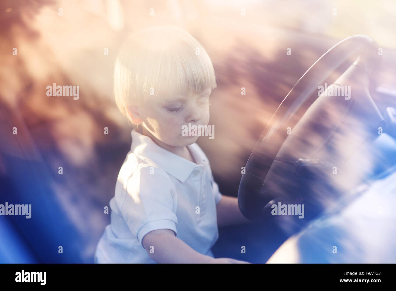 Boy driving hi-res stock photography and images - Alamy