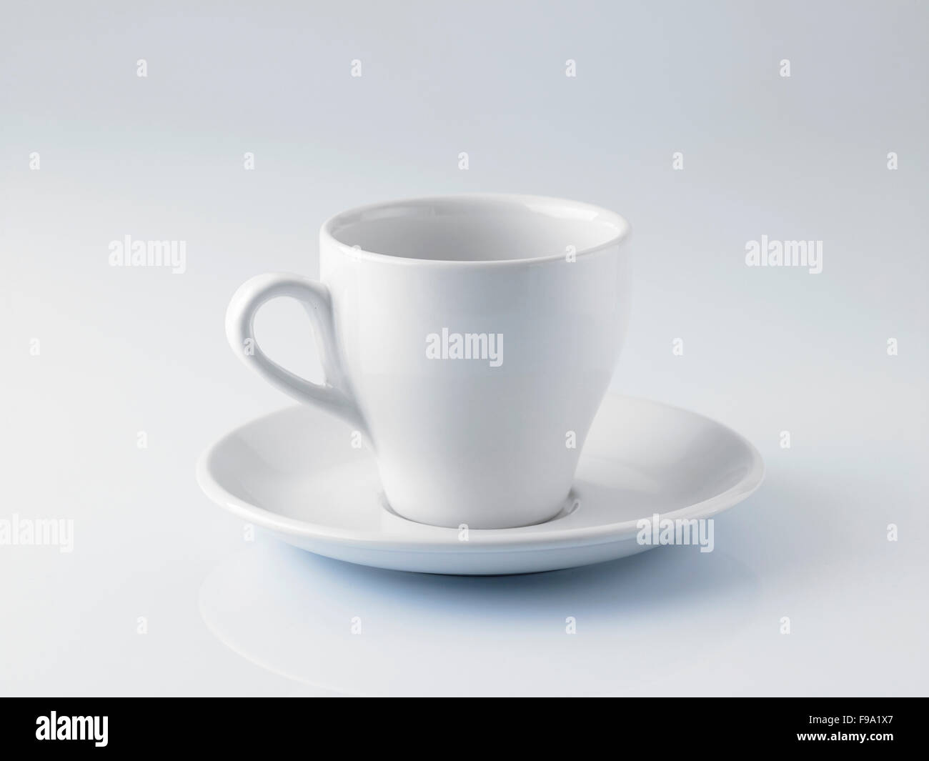 empty coffee cup on the white background Stock Photo - Alamy