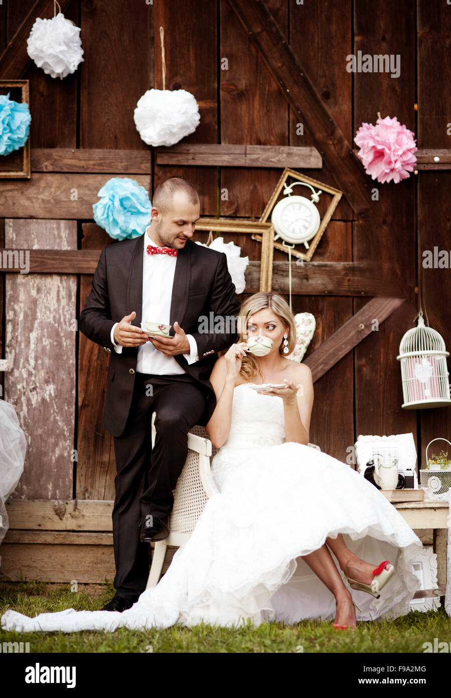 Beautiful bride and groom at their vintage style wedding Stock Photo ...